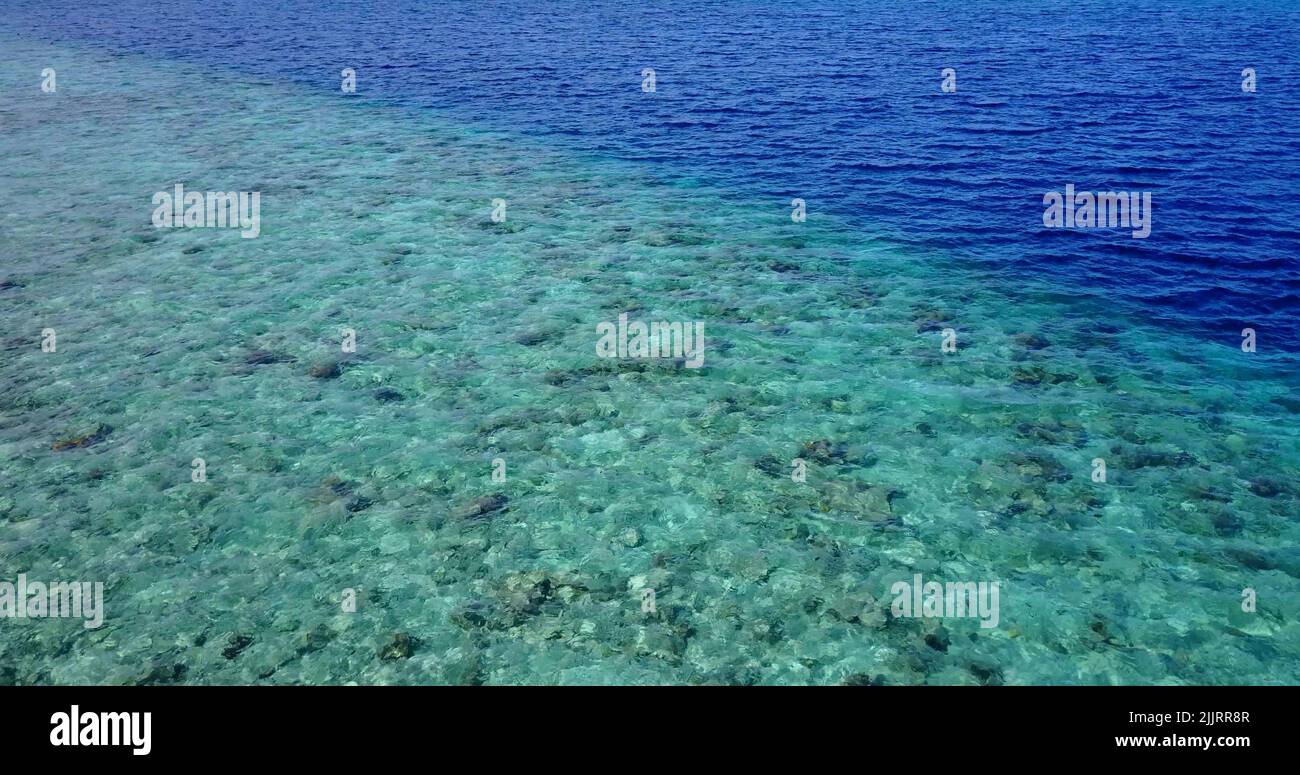 A beautiful view of a sea water changing color from blue to deep blue ...