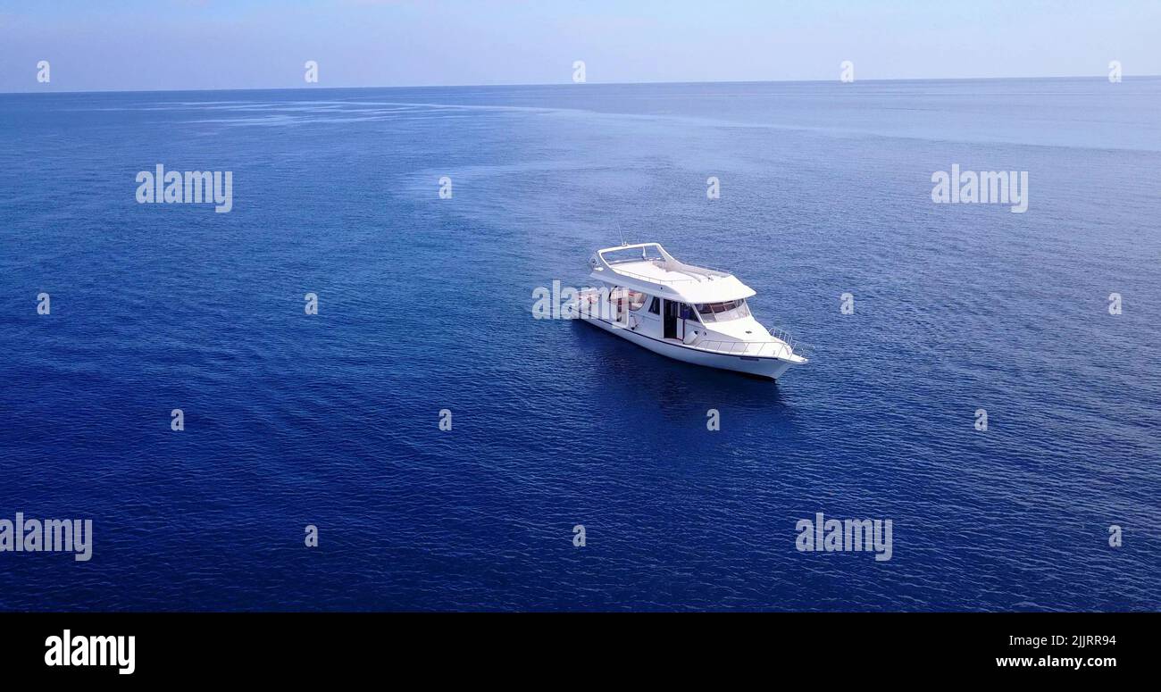 An aerial view of a yacht on the calm sea Stock Photo - Alamy