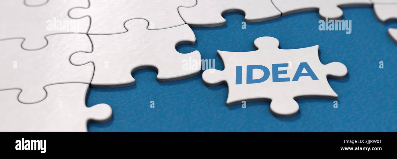 A puzzle piece with the blue word IDEA Stock Photo - Alamy