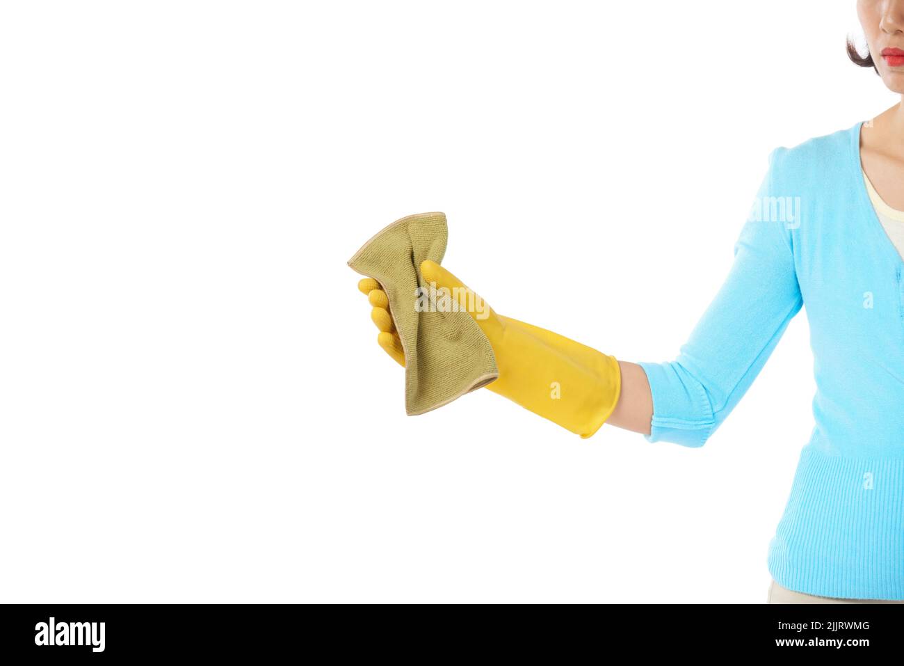 Unrecognizable housewife wearing rubber gloves holding rag in hand ...