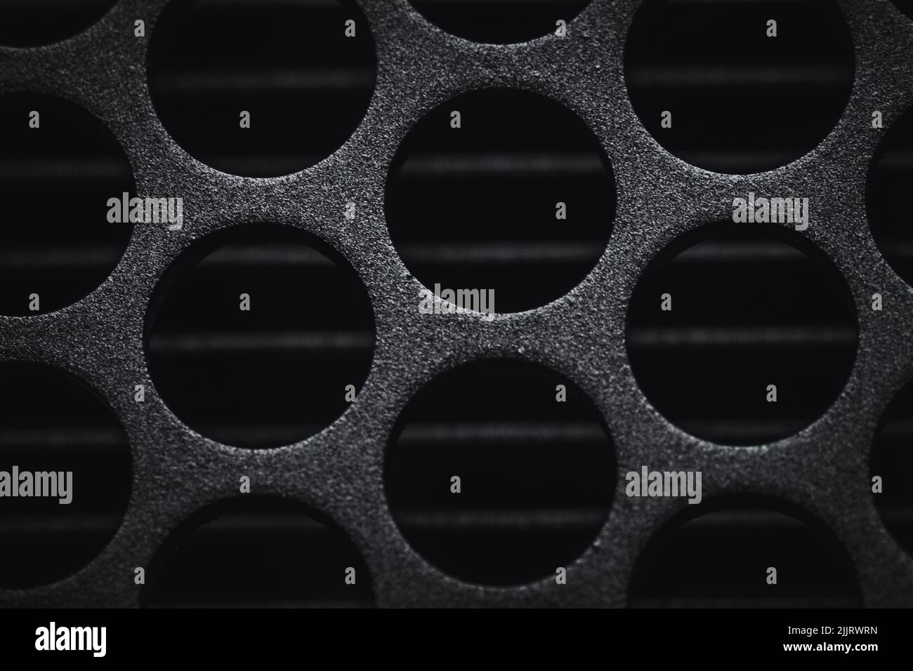 Black metal holes hi-res stock photography and images - Alamy