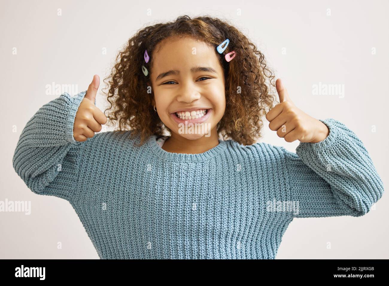 Nothing but good vibes. an adorable little girl standing alone and ...