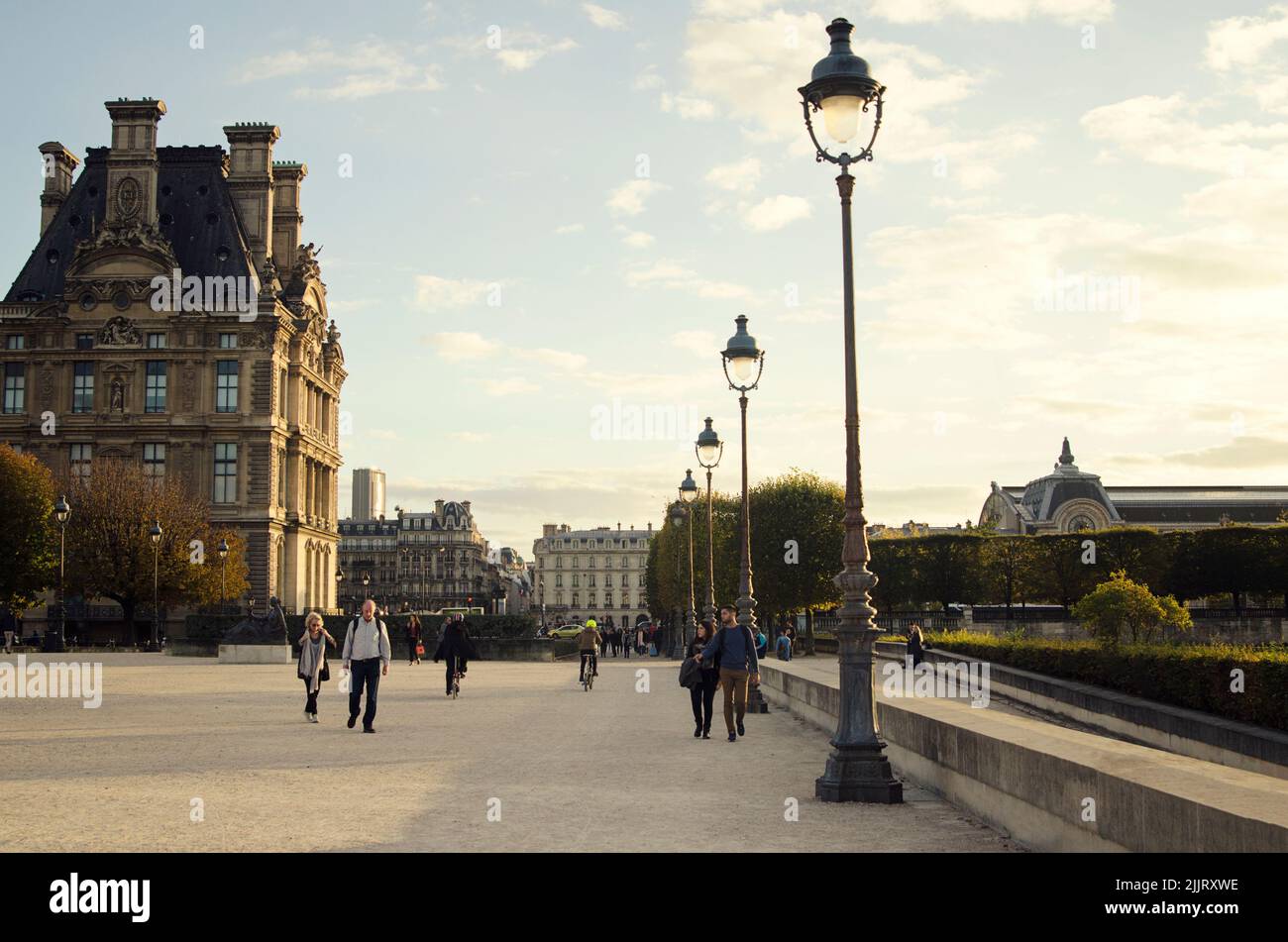 Louvre exterior with people hi-res stock photography and images - Alamy