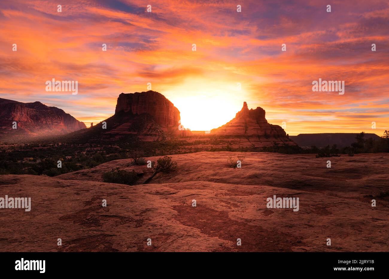 A beautiful scene of the Monument Valley Sunset under colorful sky in ...