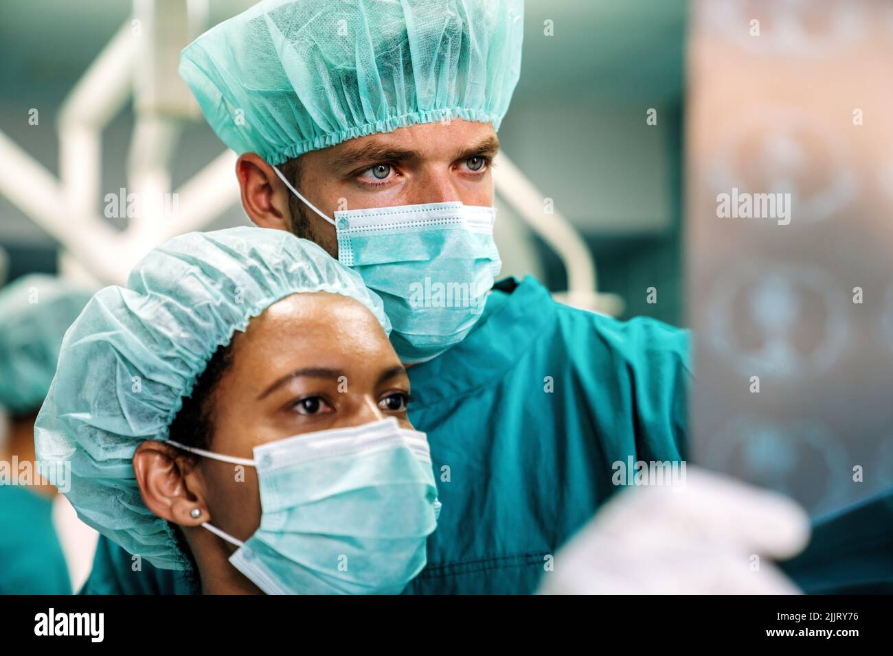 Team of surgeon at work in operating room. Healthcare, hospital concept ...
