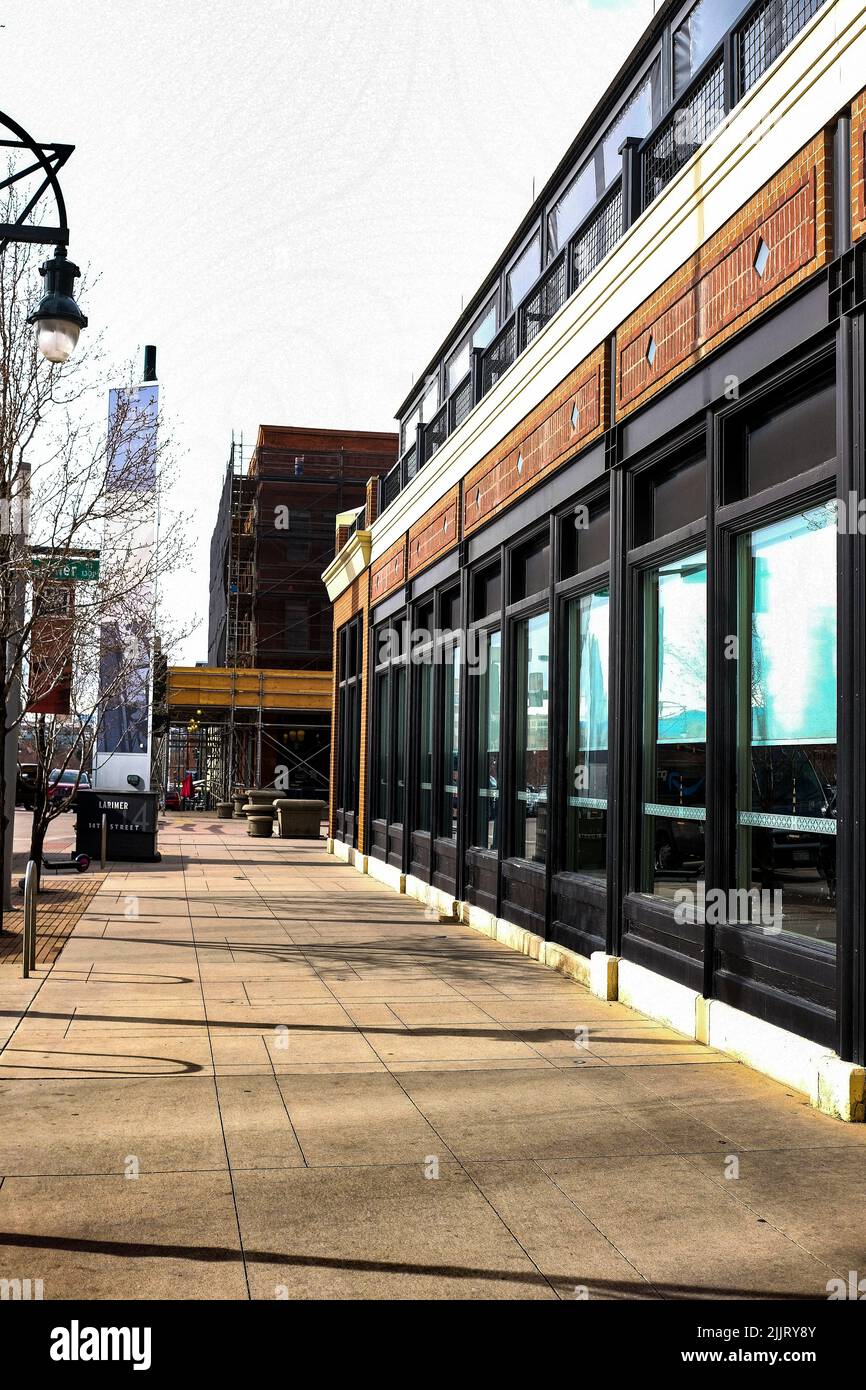 A beautiful side shot of a walking side next to a market in downtown ...