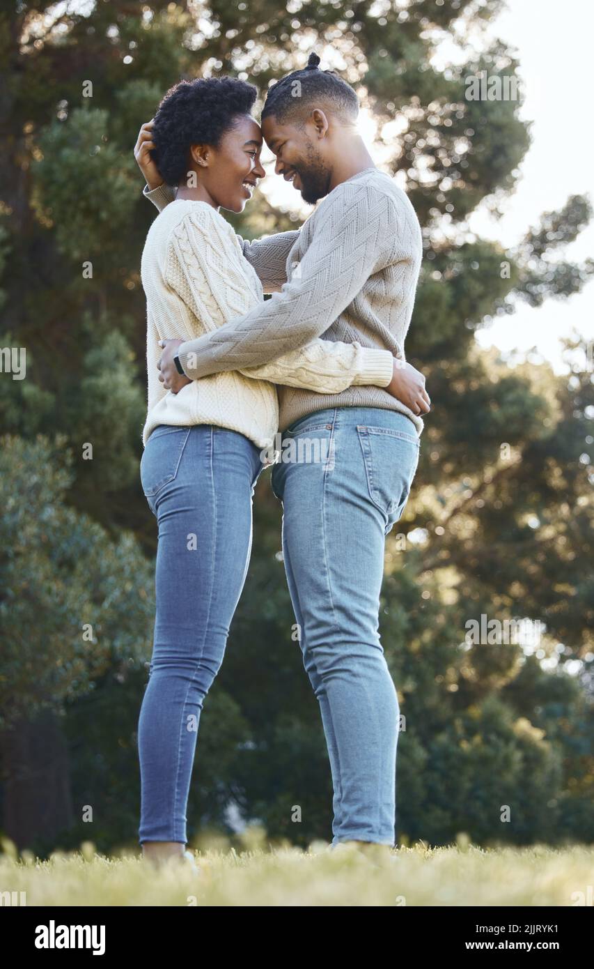 Youre the center of my universe. a young couple hugging during a ...