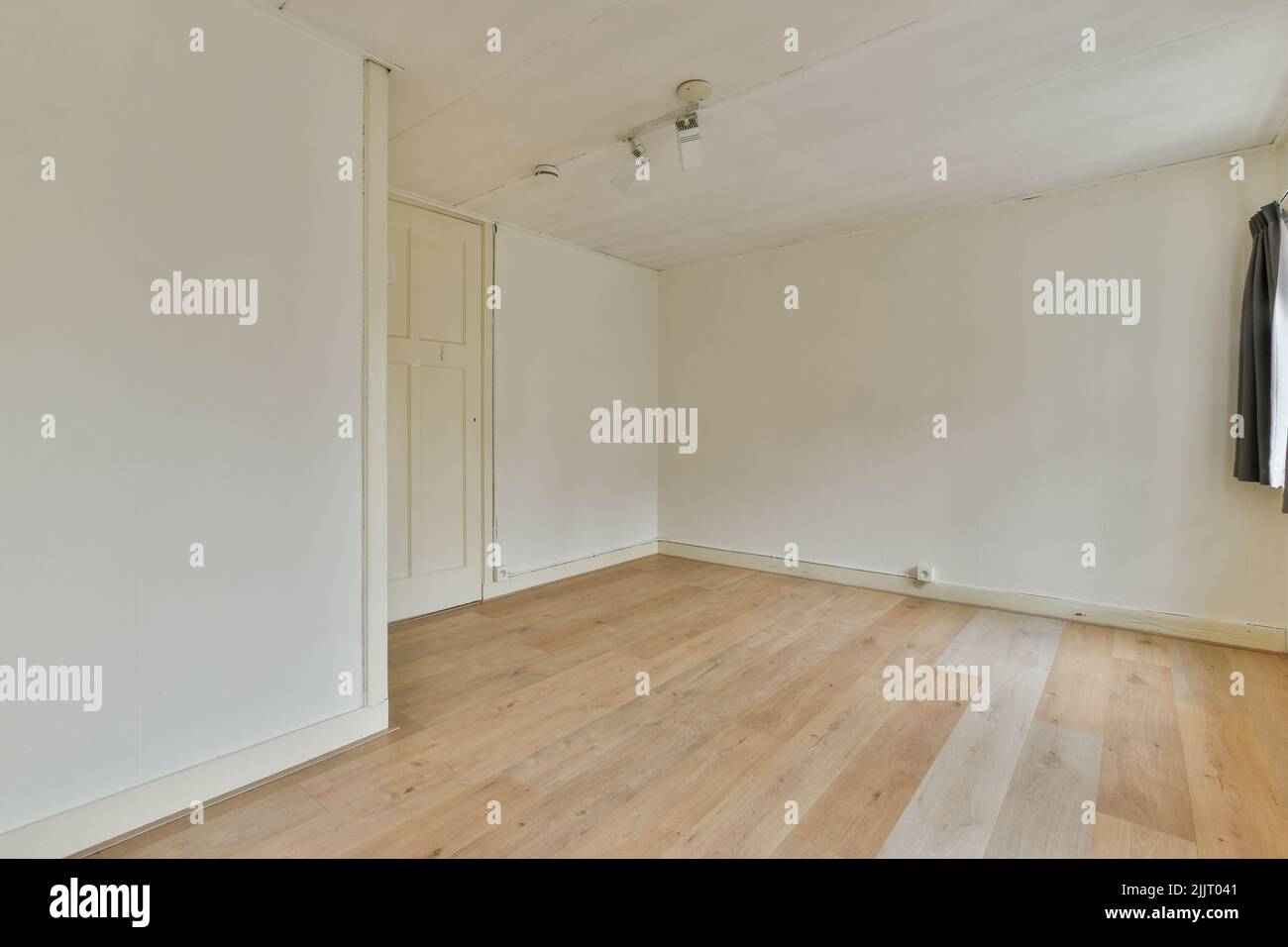 A cozy and spacious empty room in a luxury house Stock Photo - Alamy
