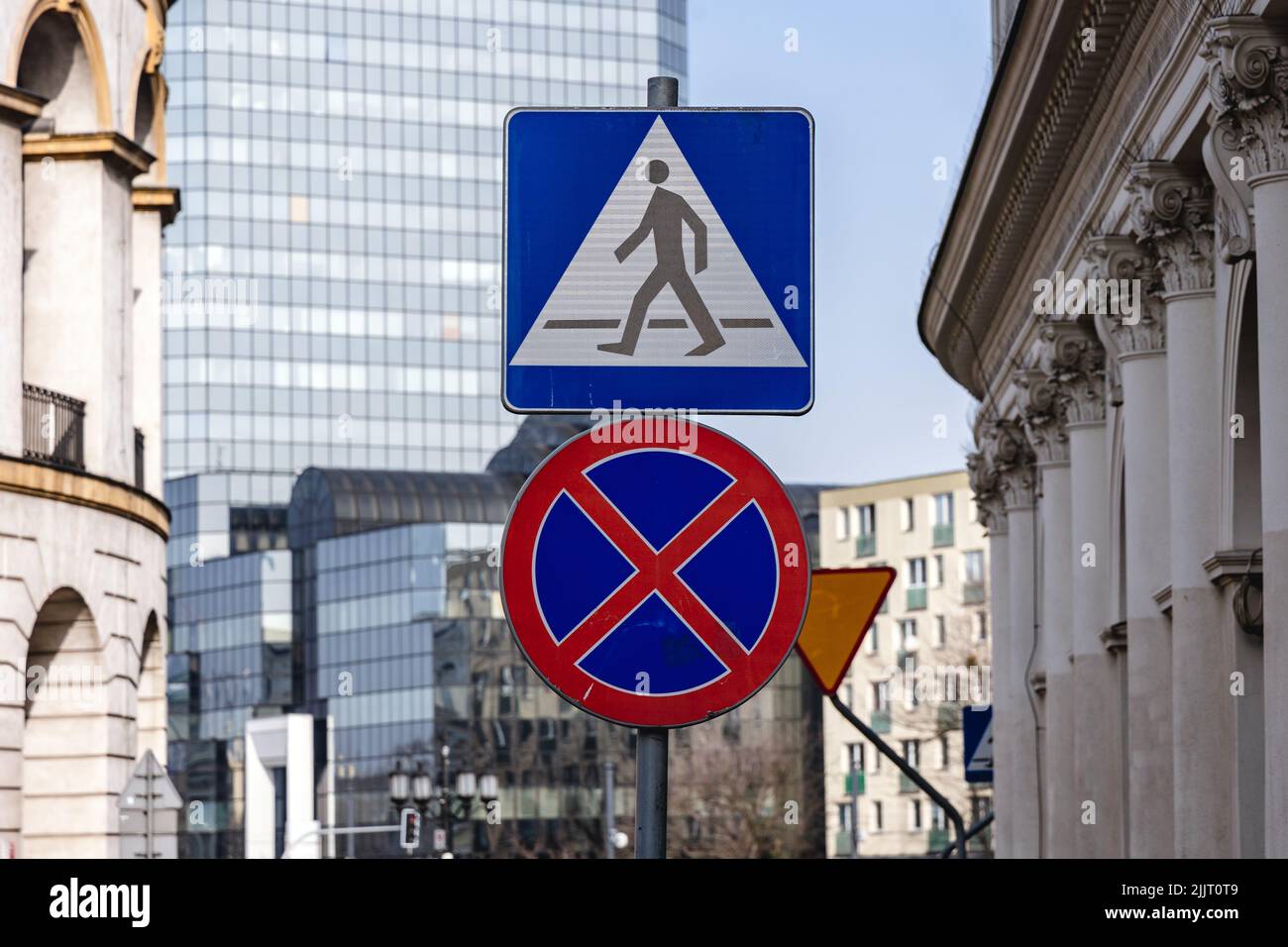 Pedestrian crossing sign and No stopping sign in Warsaw, Poland Stock ...