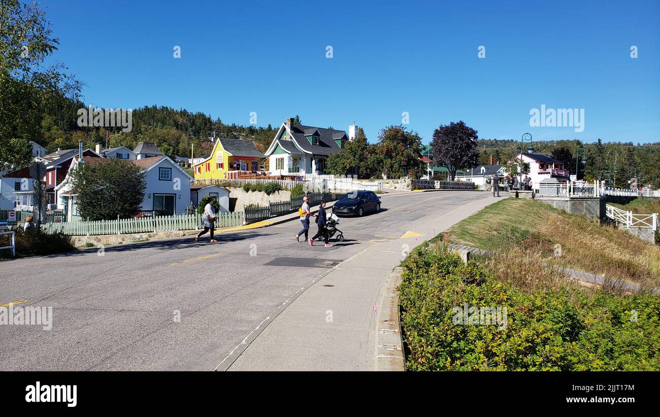 A group of people crossing the road Stock Photo - Alamy