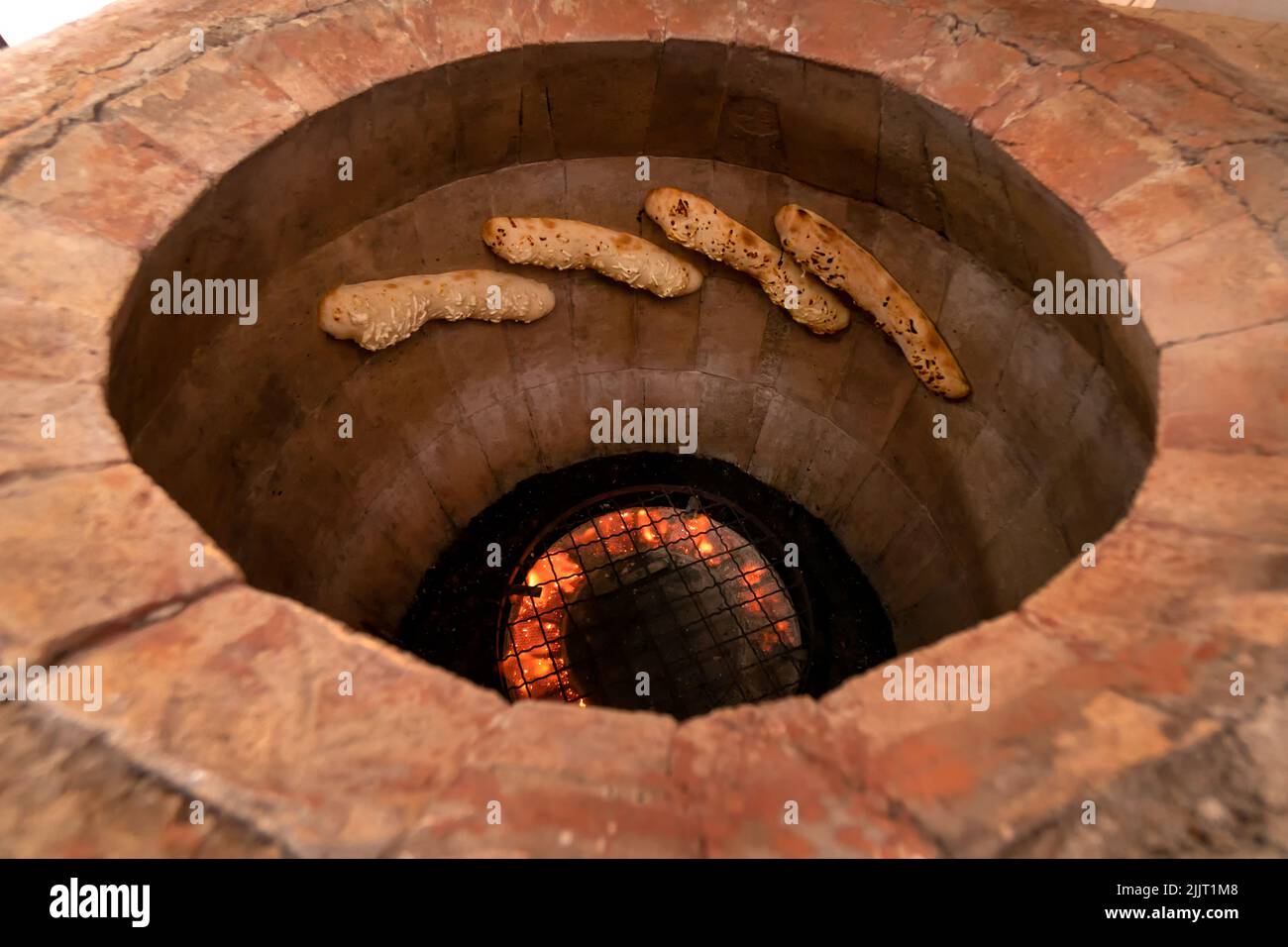 Georgian khachapuri in Megrelian baked in tandoor. Khachapuri with ...