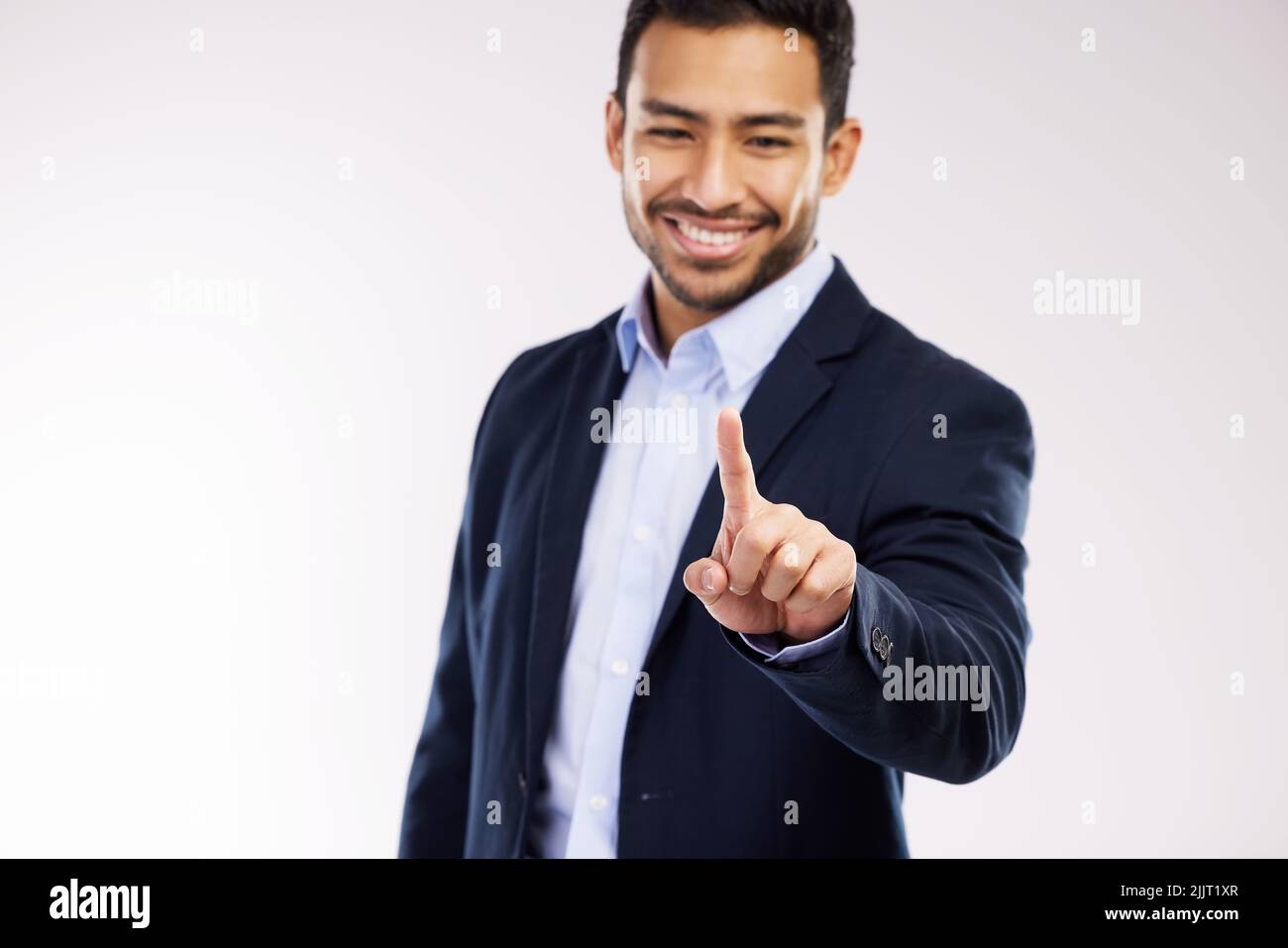 Growing his brand across multiple digital platforms. Studio shot of a ...