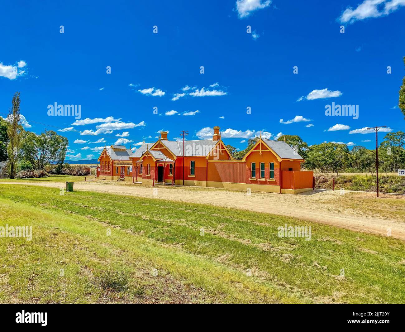 An old Deepwater railway station in a green field in New South Wales ...