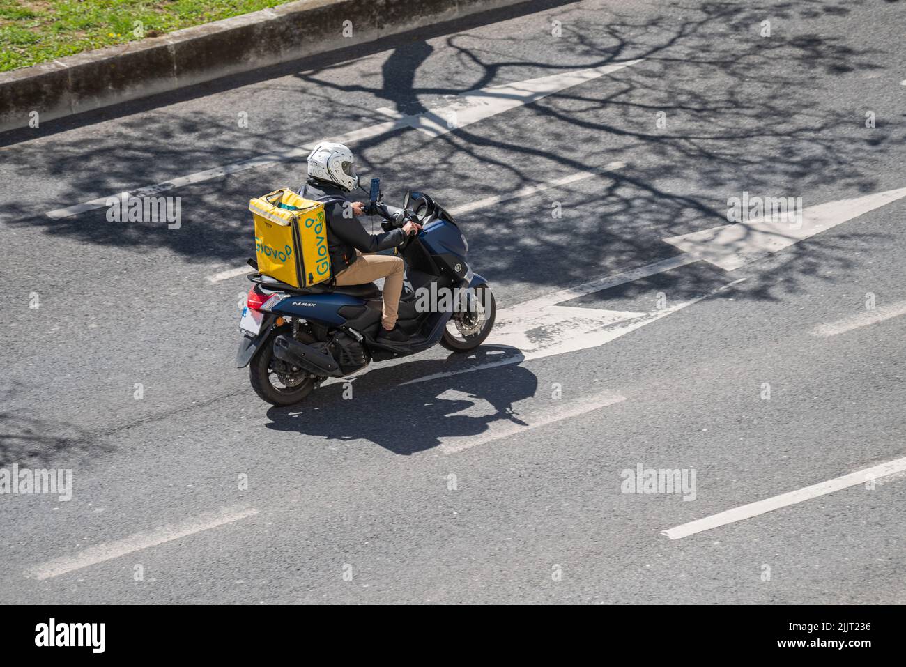 A photo of Glovo company courier, a service for the collection and ...