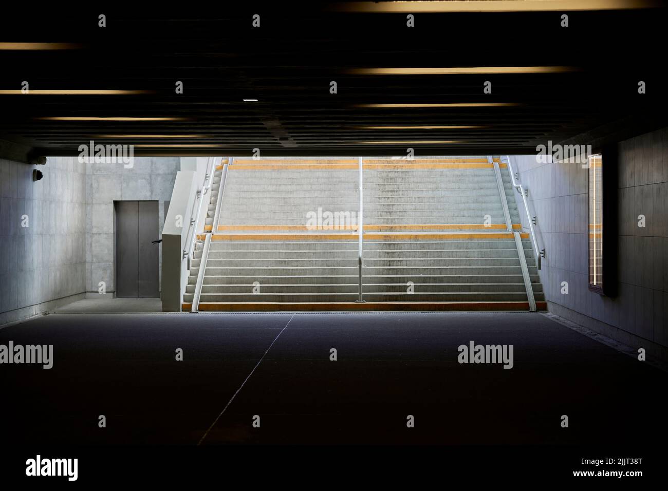 A closeup of stairs of an underground passage leading to the outside ...