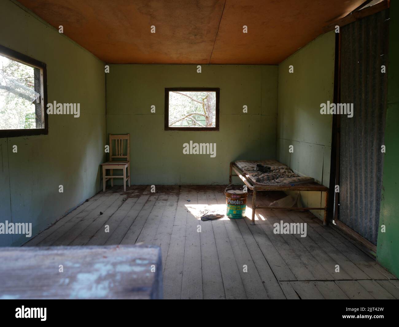 An interior of an old abandoned ruined bedroom Stock Photo - Alamy