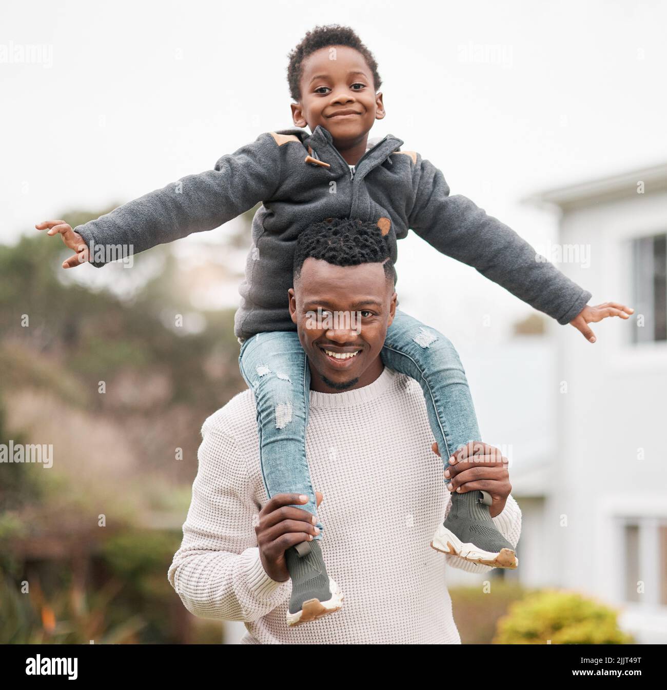Dad will always be there to lift him up. Portrait of a father and his ...
