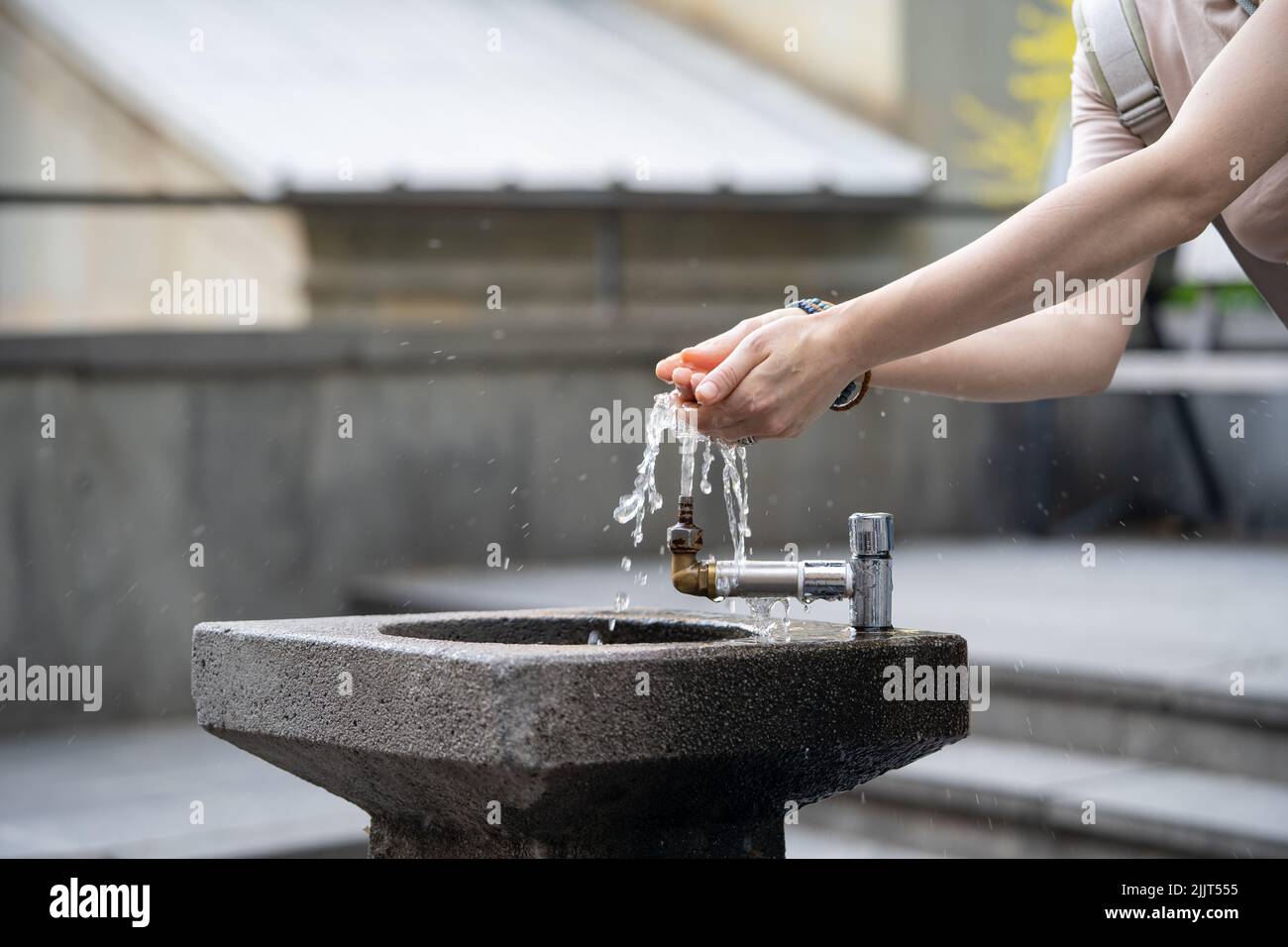 Hydration and aqua balance regulation for health. Hands with water ...