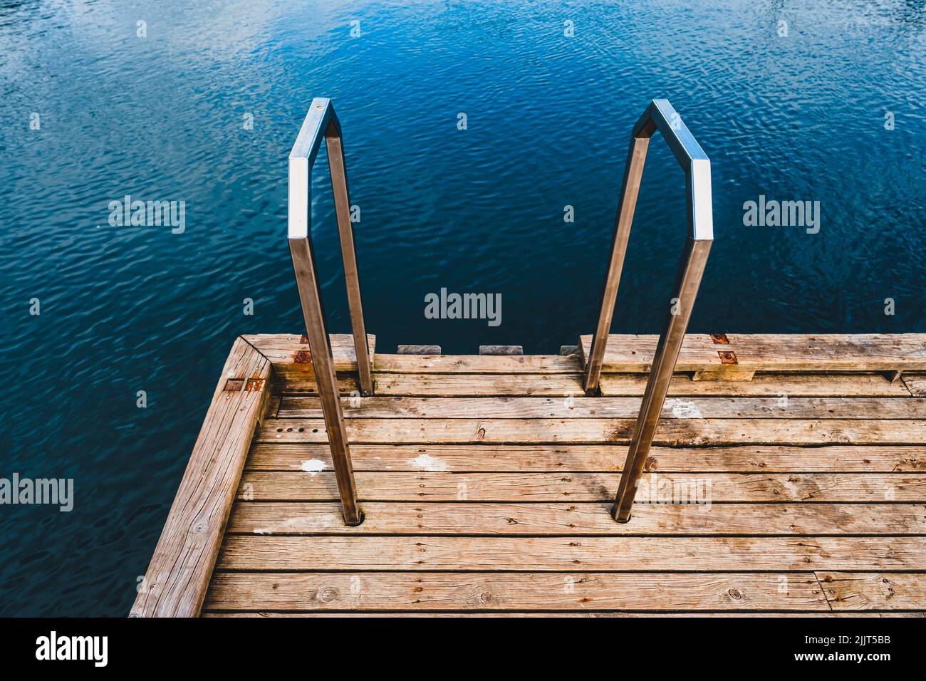 A natural view of a stair holder on the lake Stock Photo - Alamy