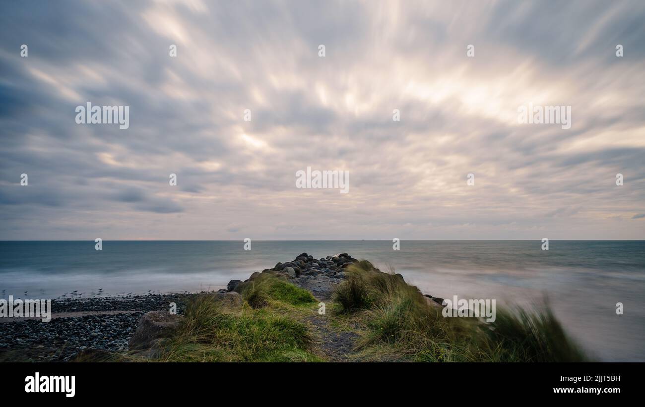 A natural view of a cliff overseeing the ocean in New Plymouth, New ...