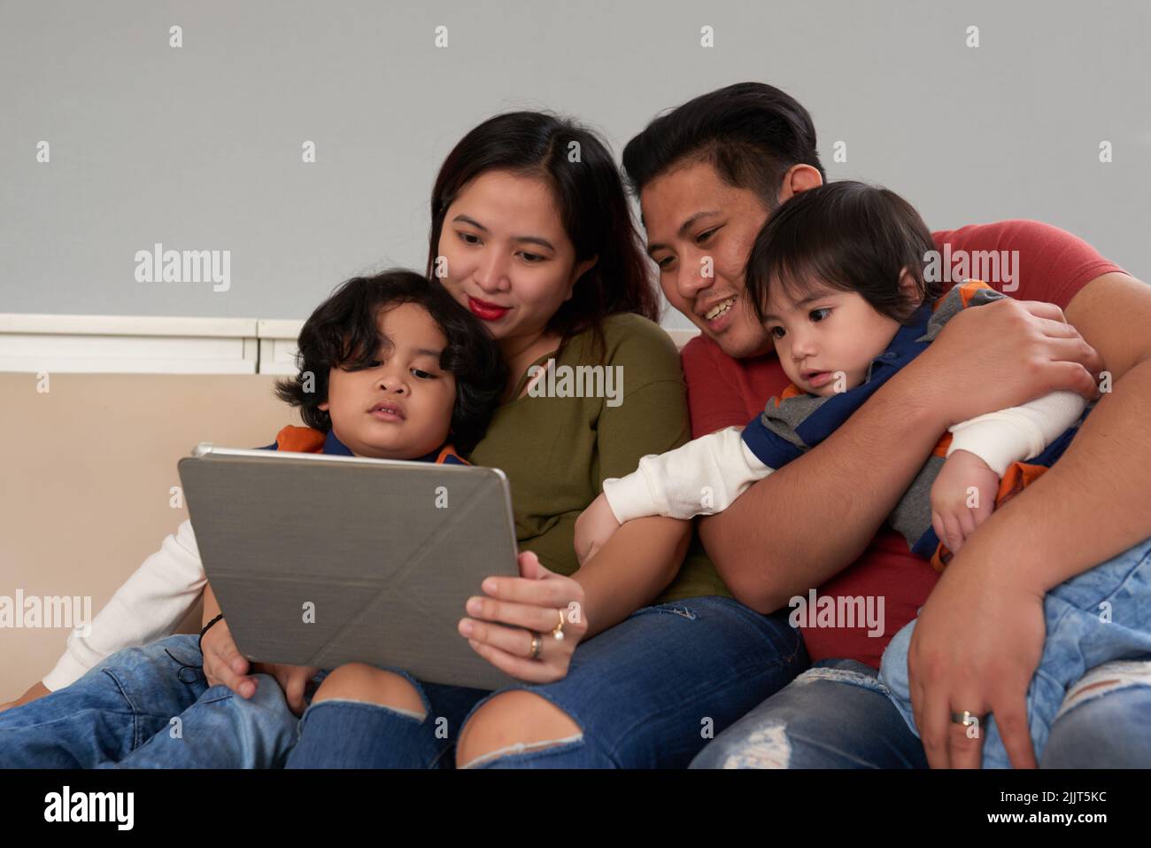 Filipino Family Watching Tv