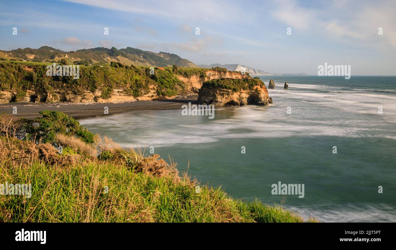 A natural view of cliff and sea in Three Sisters and the Elephant Rock ...