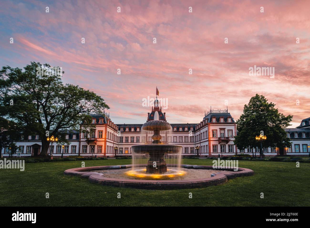 The Schloss Philippsruhe castle at sunset in Hanau, Germany Stock Photo ...
