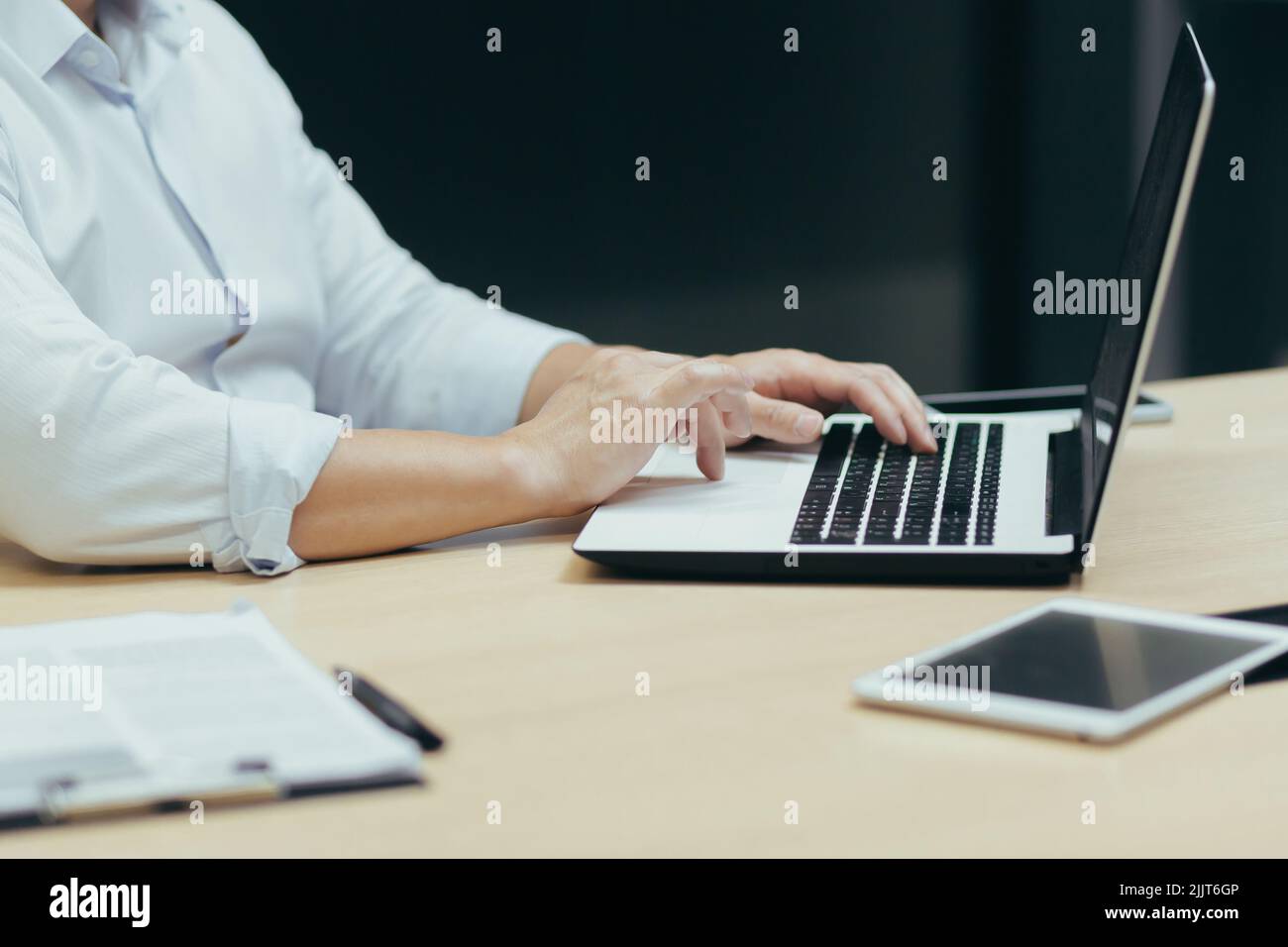 Close-up photo. The hands of a young businessman, a freelancer, an IT ...