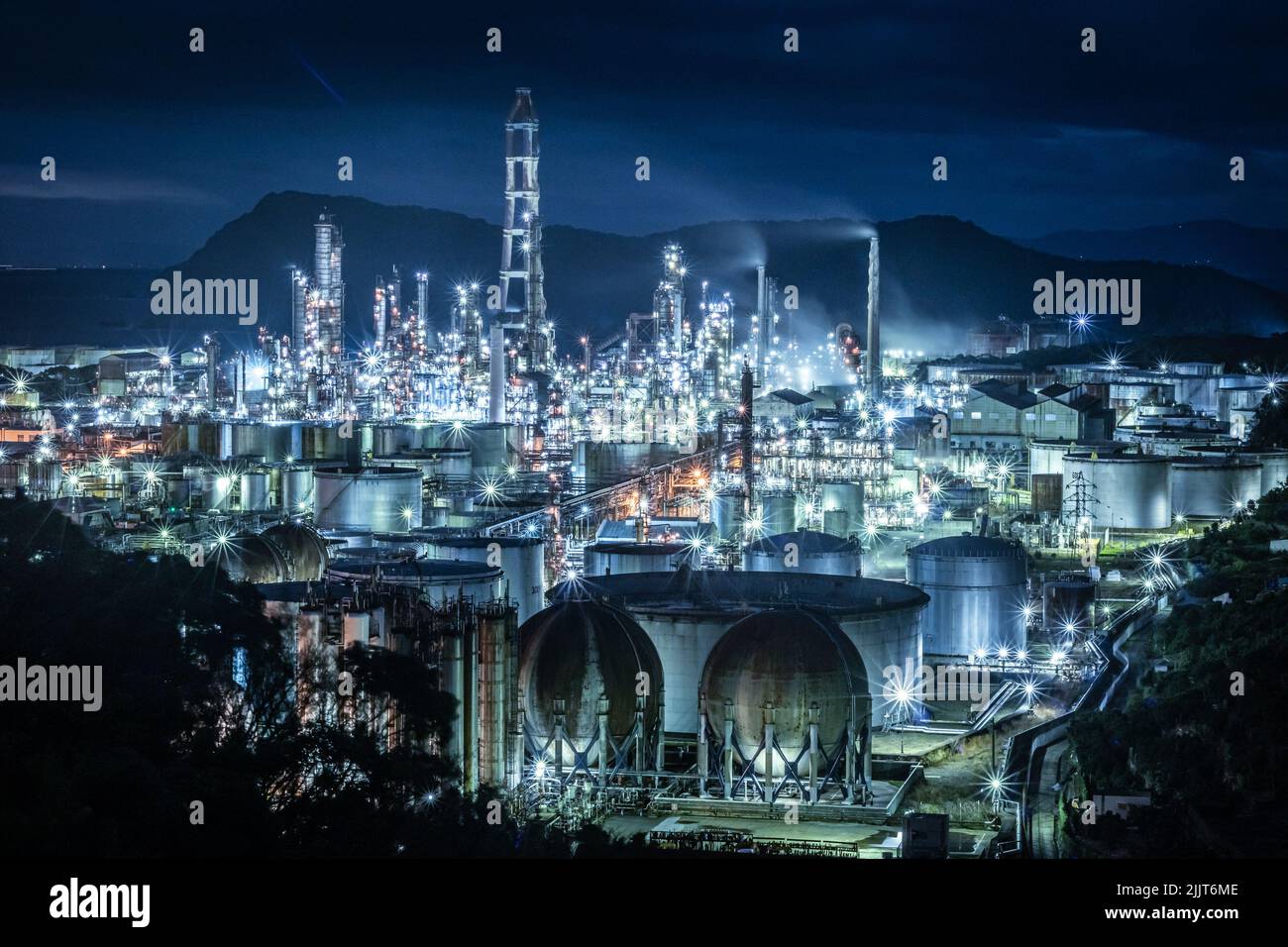 A high angle shot of modern buildings at the dark night in Wakamaya ...