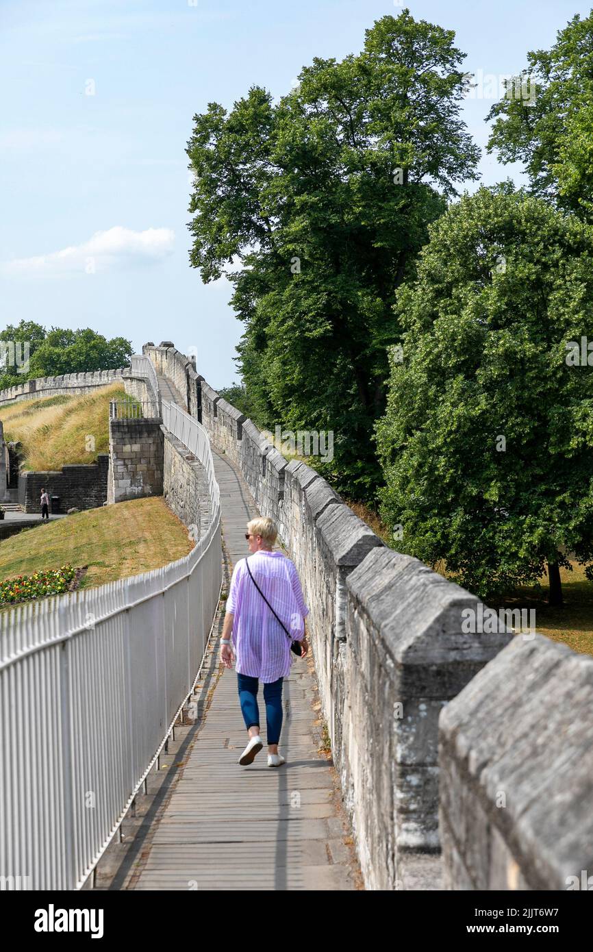 City of York ancient roman walls, female blonde tourist model released ...