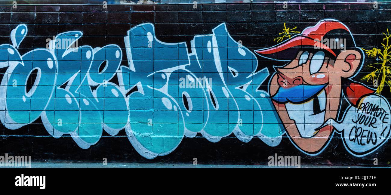 A shot of social graffiti street art mural of alt Mario with red hat ...