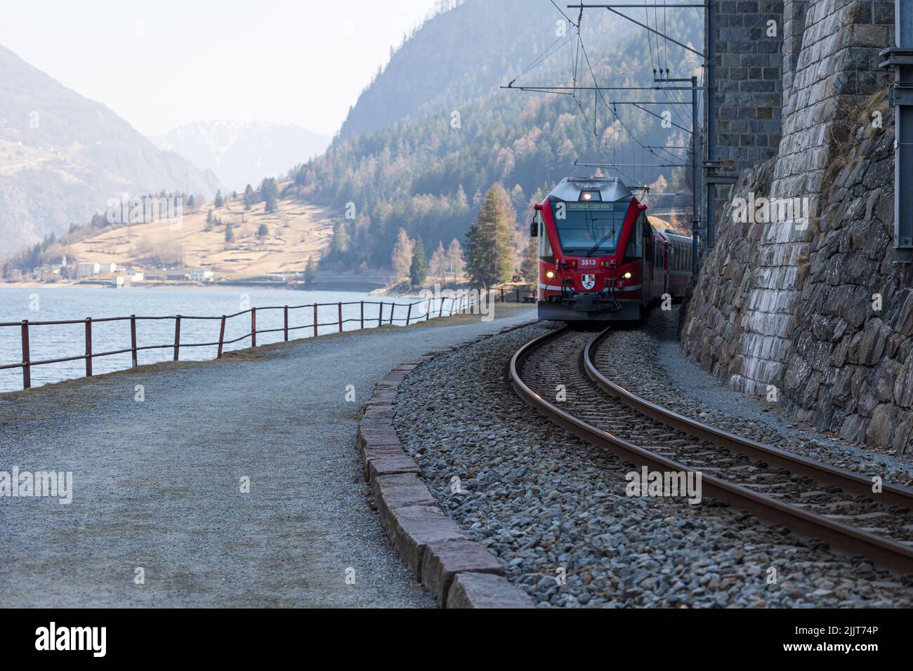 The famous red Alpine Bernina Express train on the way.Switzerland ...