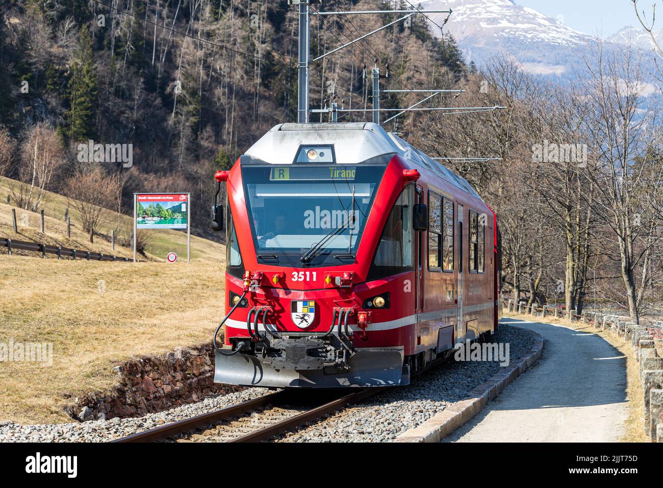 The famous red Alpine Bernina Express train on the way.Switzerland ...