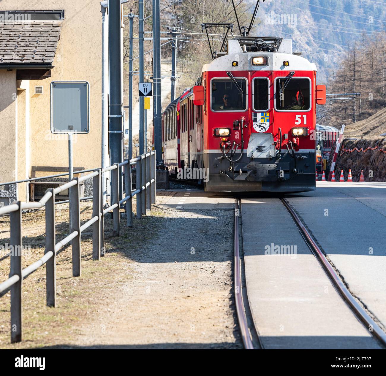 The famous red Alpine Bernina Express train on the way.Switzerland ...