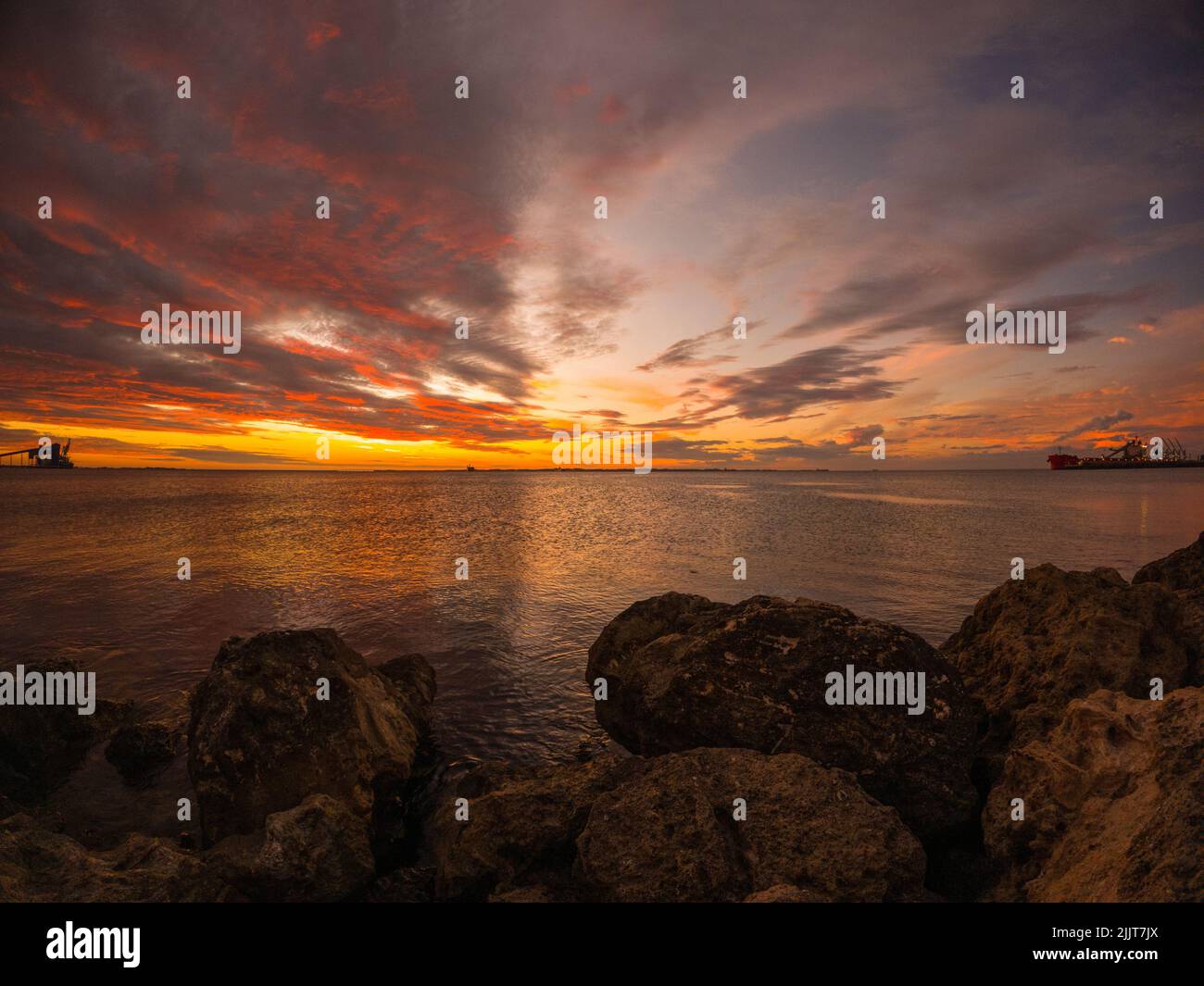 A beautiful landscape view of a dusk sky at sunset over Kwinana Beach ...