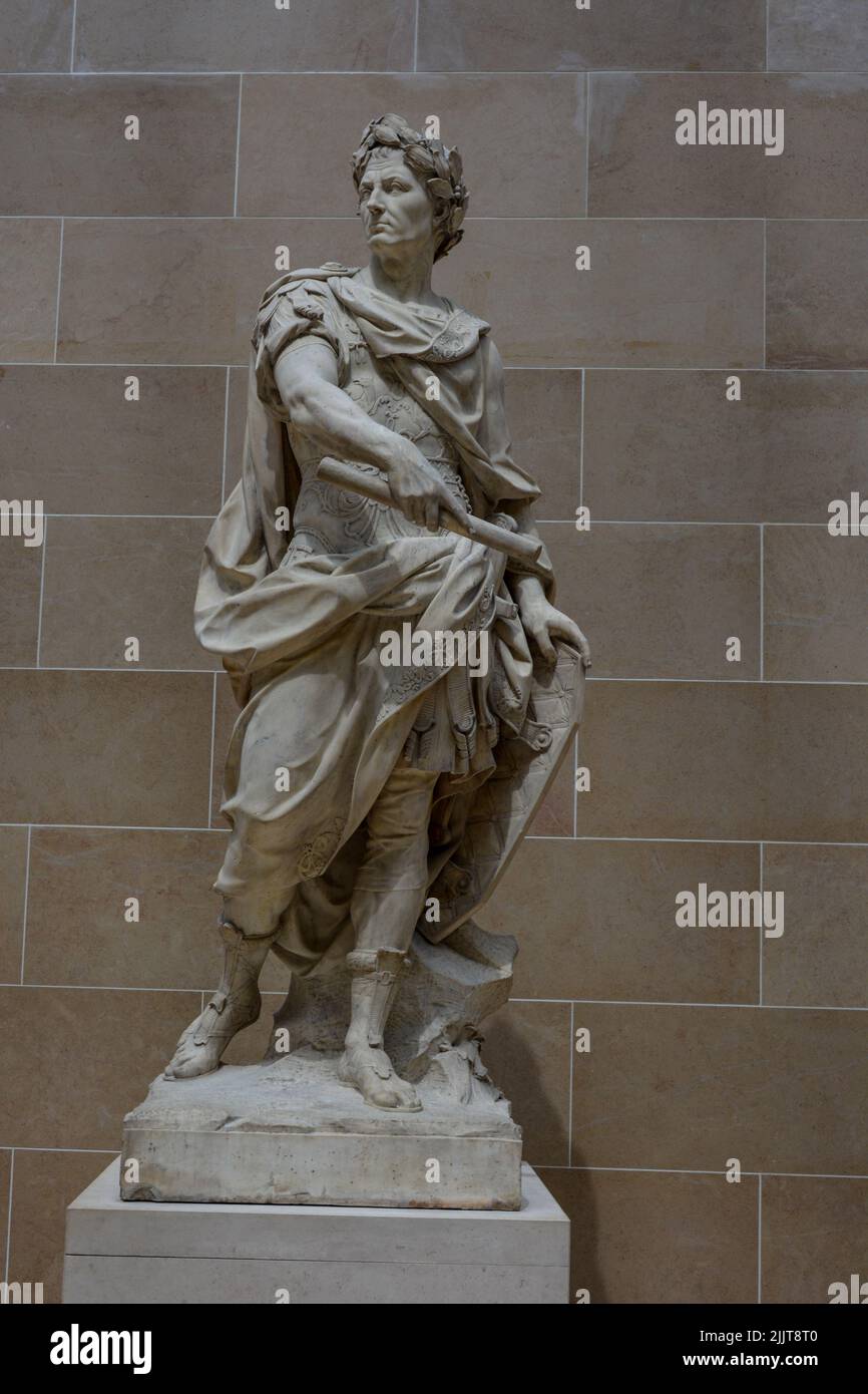 A vertical shot of Julius Caesar sculpture in museum, Paris, France ...