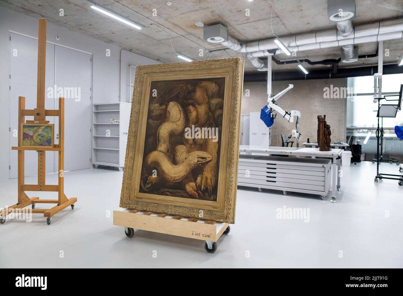 Painting on display in restoration workshop atelier in Boijmans van ... Painting on display in restoration workshop atelier in Boijmans van ...