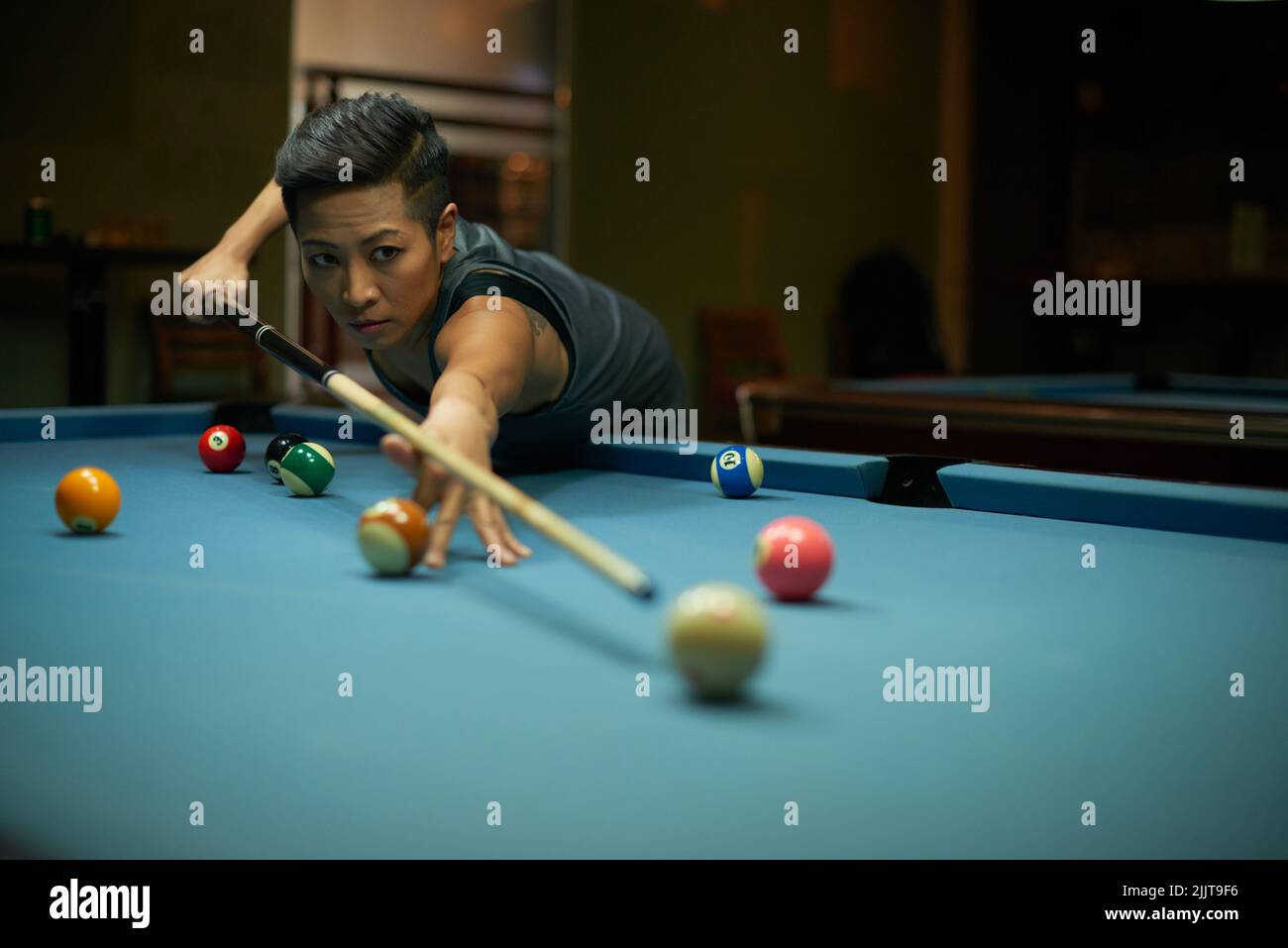 Billiard player searching for right position for the hit Stock Photo ...