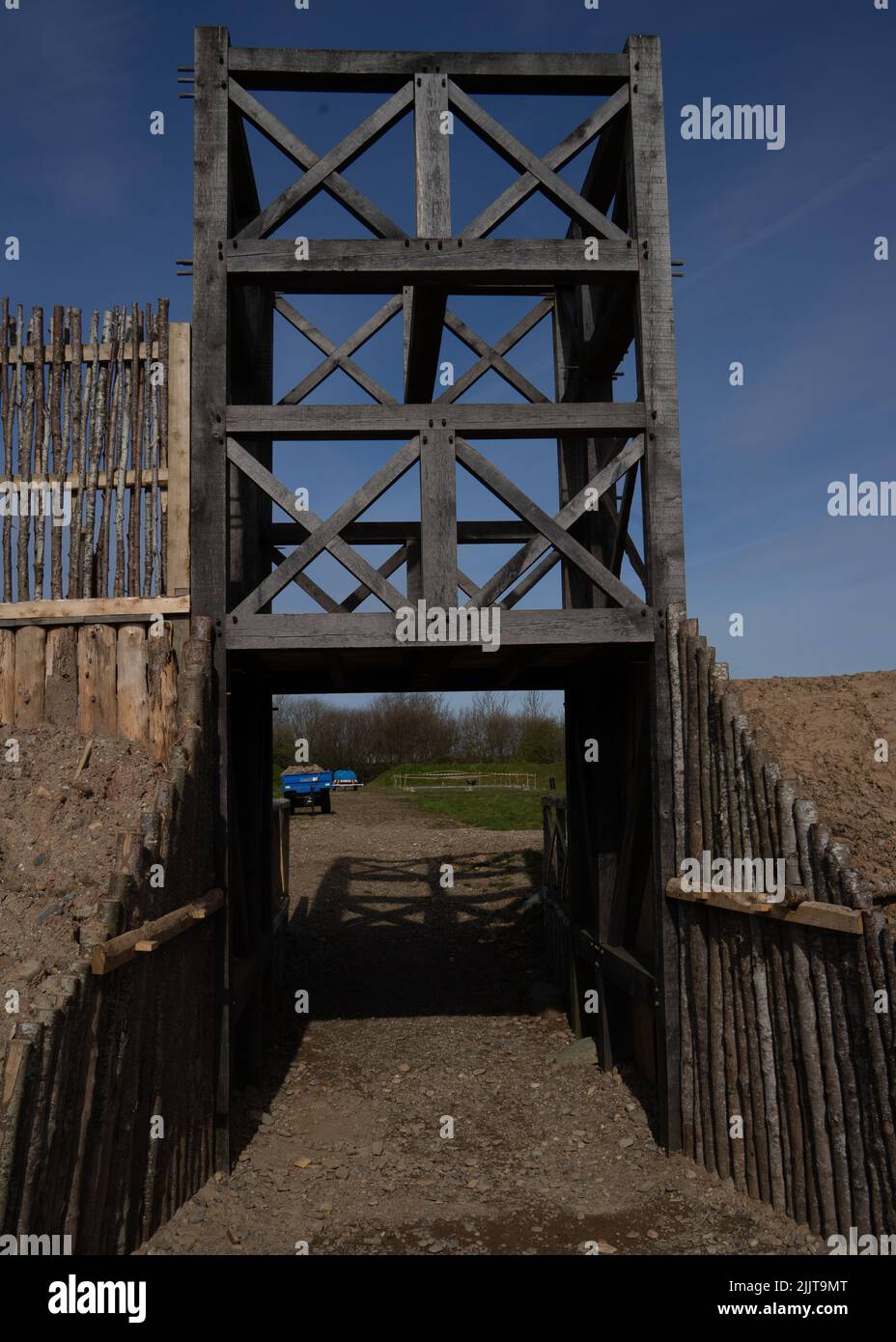 A vertical shot of an antique wooden Roman fort built in North Wales on ...