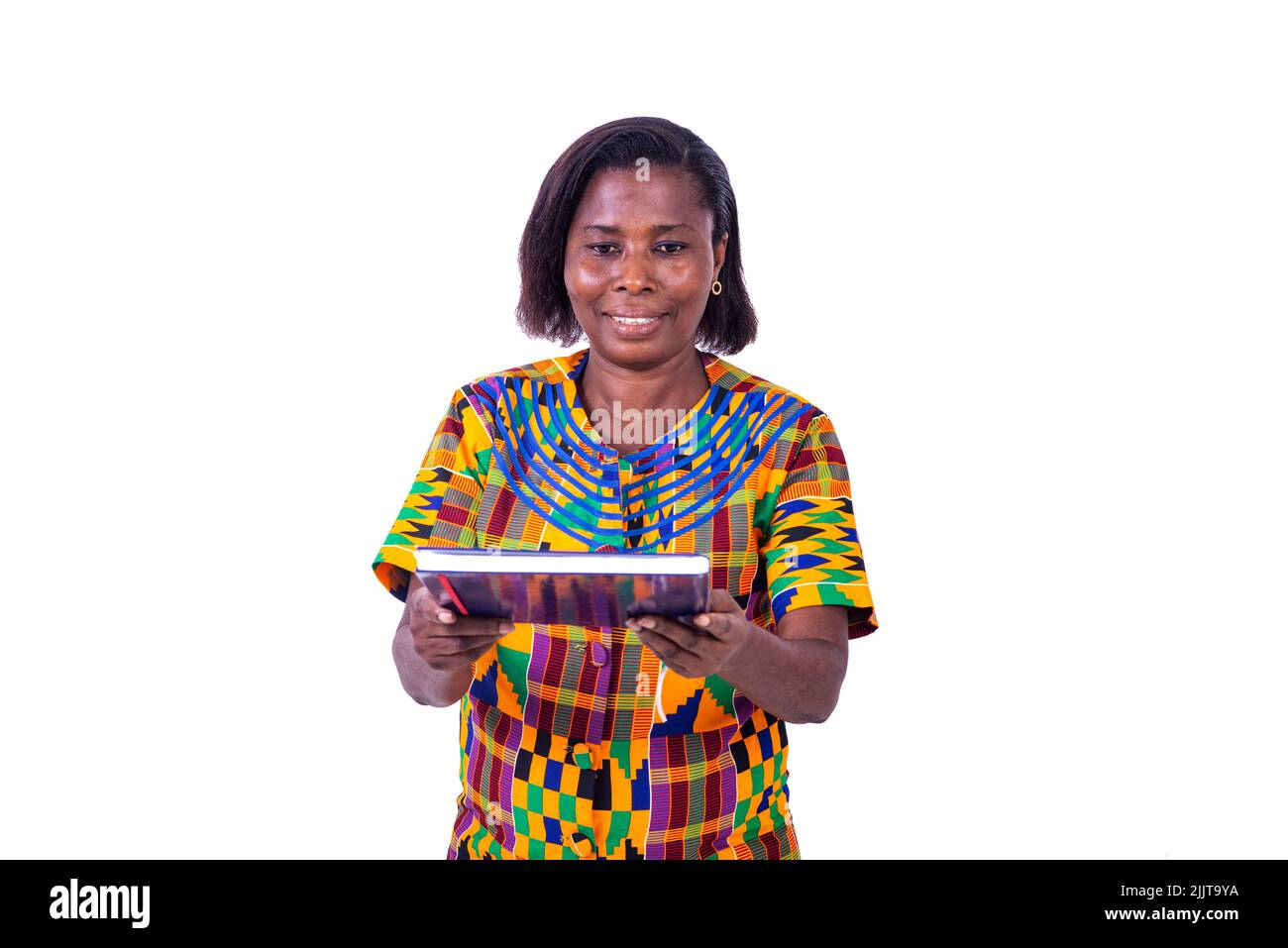 beautiful smiling adult woman standing and giving a notebook while ...