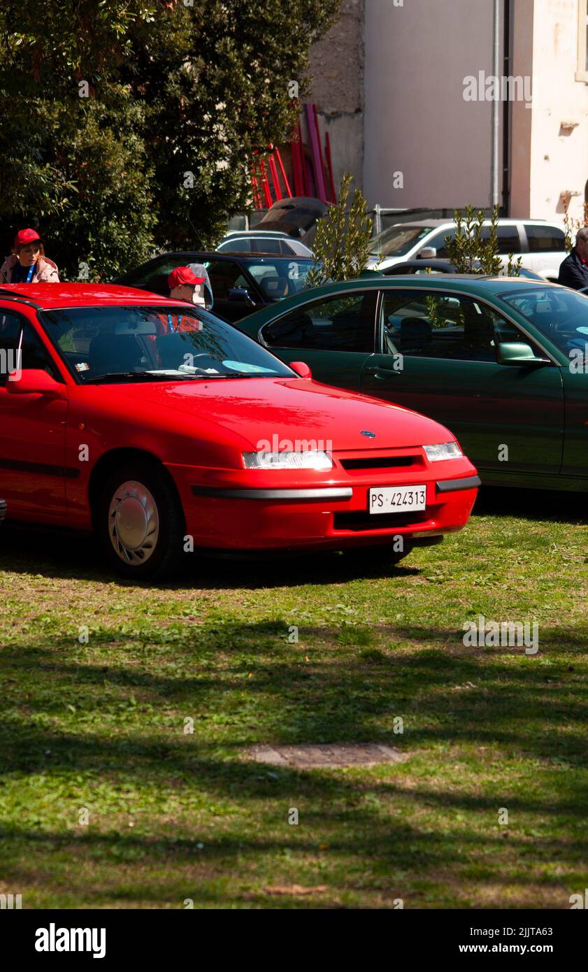 A vertical shot of retro cars on display at a car show Stock Photo - Alamy
