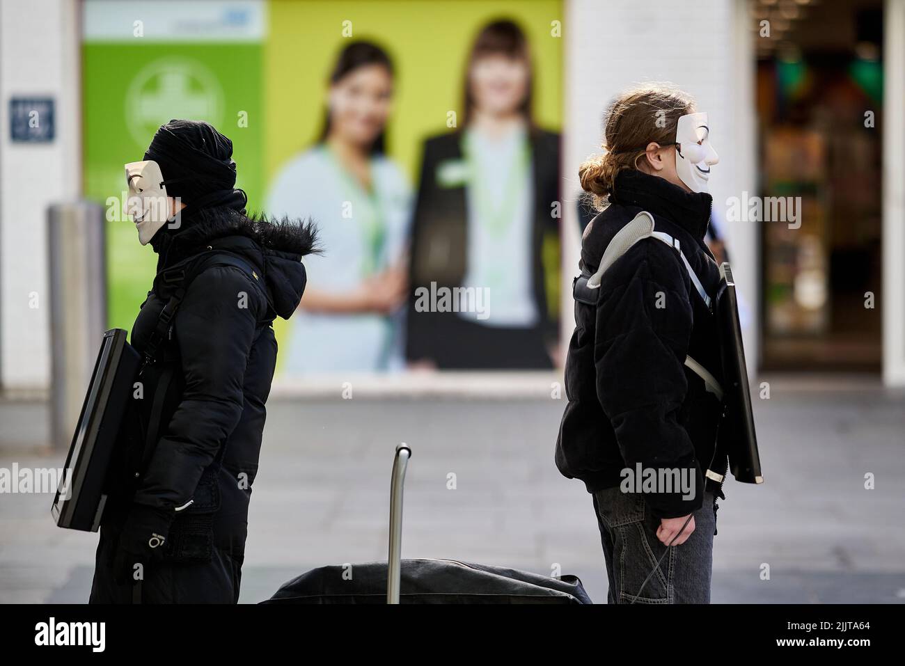 The "Anonymous" protest on the streets of Slough UK Stock Photo - Alamy