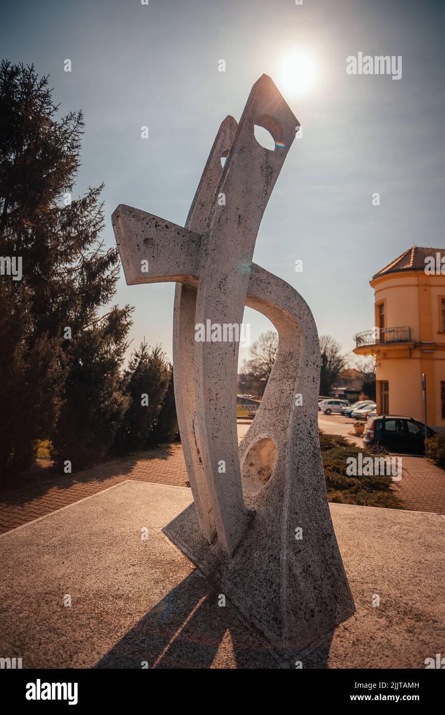 A vertical shot of a beautiful Monument sculpture to Hasan Aganovic in ...