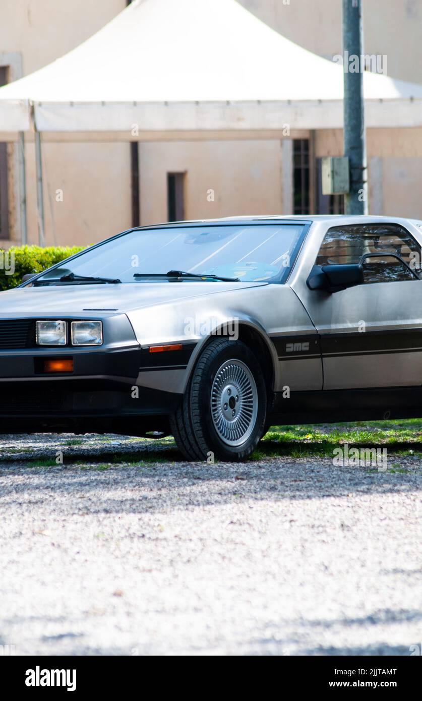 A vertical shot of retro DeLorean on display at a car show Stock Photo ...