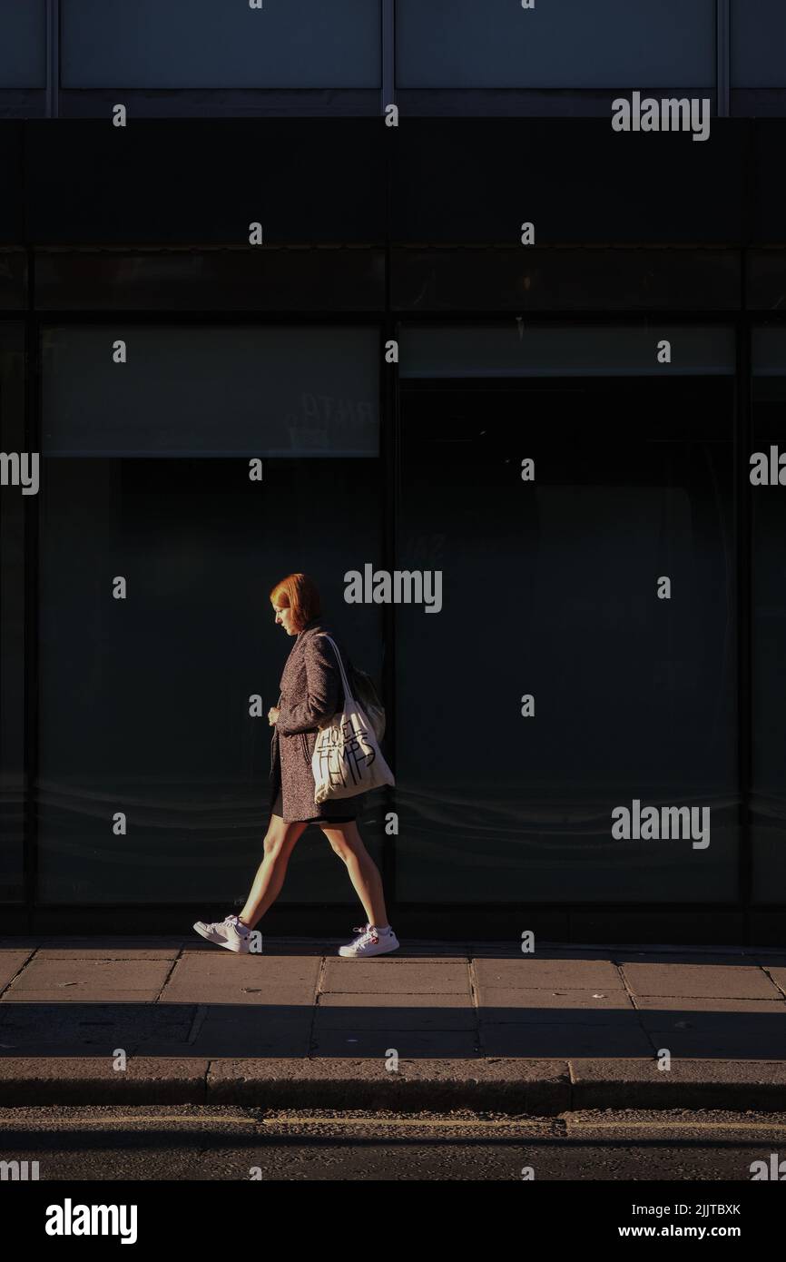 Female walking outdoors hi-res stock photography and images - Alamy