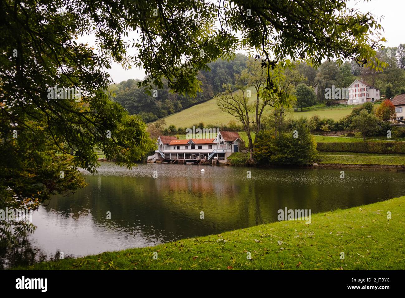 Beautiful shot of a building behind a calm river located in Saint ...