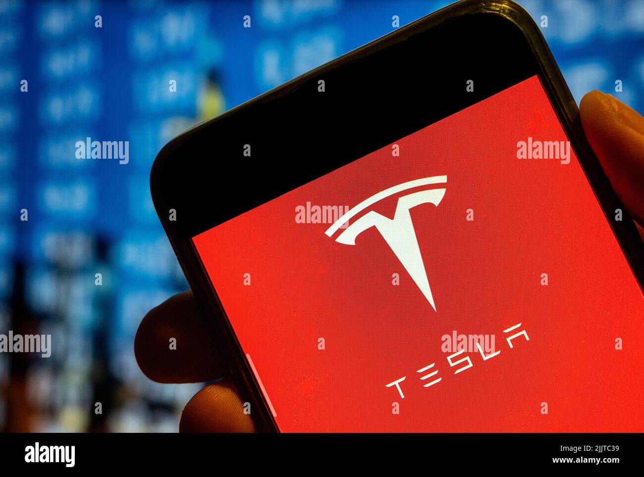 In this photo illustration, the American EV electric car manufacturing ...