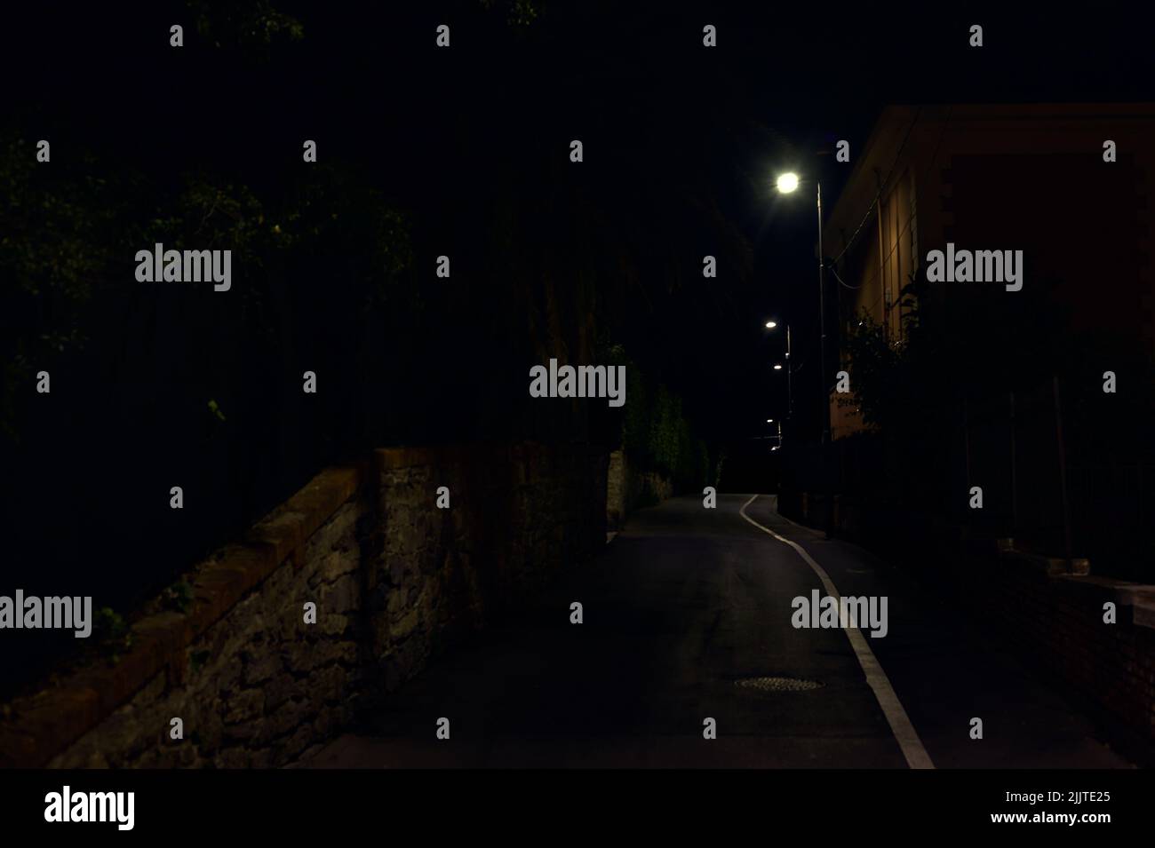 Alleyway night brick wall hi-res stock photography and images - Alamy