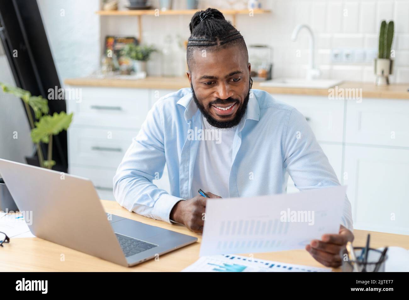 confident businessman freelancer analyzing annual sales chart Man ...