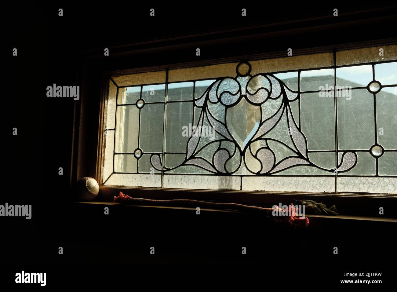 A closeup of a stained glass window of a house in Saint Paul, Minnesota ...